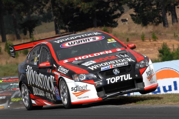 Andy Booth in action in the Woodstock Racing Commodore at the opening ...